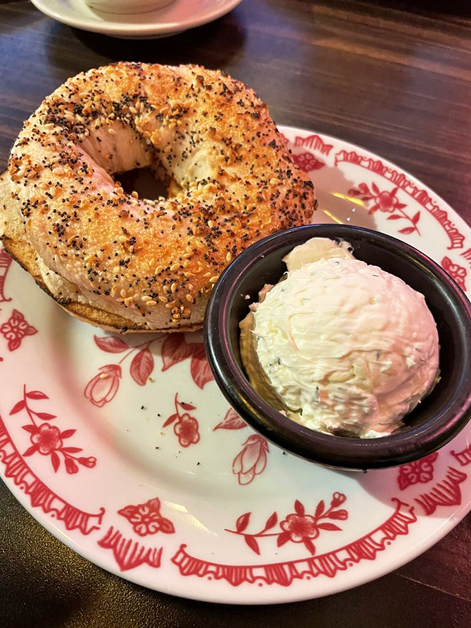 The everything bagel &ndash; where "everything" means exactly that. Paired with cream cheese that's been elevated from condiment to art form.