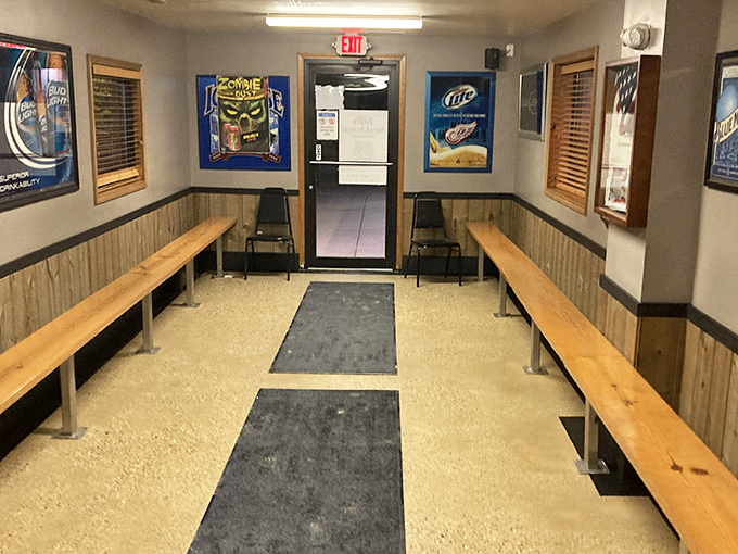 Even the exit hallway has character. Those wooden benches have supported many a satisfied diner contemplating whether to order dessert.