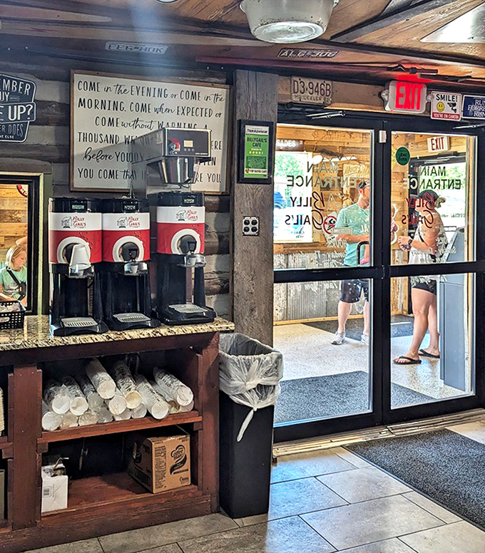 The exit sign might as well read "Return to normal-sized food world." Note the coffee dispensers standing ready for those needing liquid courage.