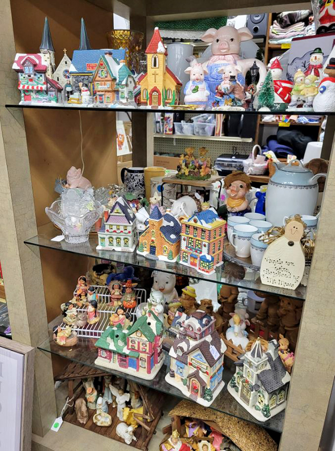 Miniature village collection that's one tiny dog away from a Hallmark Christmas movie set. Collect the whole town!