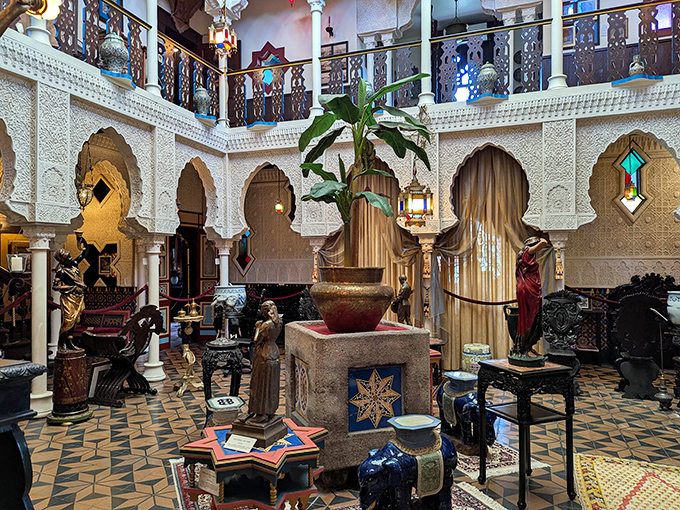 The central court showcases an explosion of patterns&mdash;star-shaped tiles, horseshoe arches, and carved columns creating a space where every glance reveals another intricate detail.