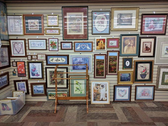 Wall-to-wall framed art creates a gallery of possibility. That perfect living room statement piece is hiding somewhere in this magnificent mishmash.