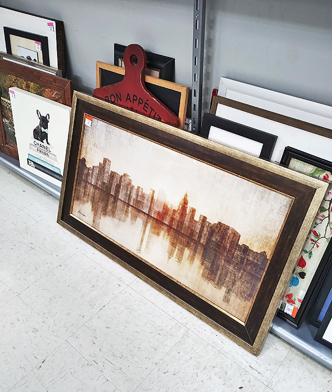 Wall art that spans from sophisticated cityscapes to whimsical kitchen declarations. That "Bon App&eacute;tit" cutting board is practically begging to star in your kitchen.