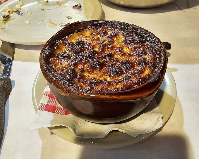 French onion soup with a cheese cap so perfectly caramelized, it deserves its own standing ovation. Spoon-breaking satisfaction guaranteed.