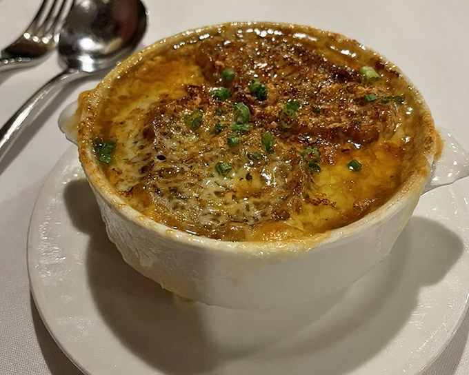 French onion soup that's achieved the perfect cheese-pull potential&mdash;a bubbling cauldron of comfort that's worth every inevitable dry-cleaning bill.