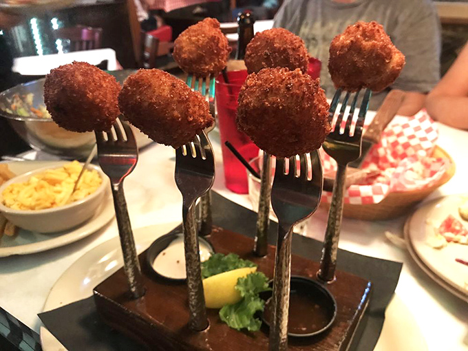 Fried scallops elevated to an art form&mdash;each one perched on its own fork pedestal, creating a bouquet of golden-brown deliciousness that's almost too pretty to eat. Almost.