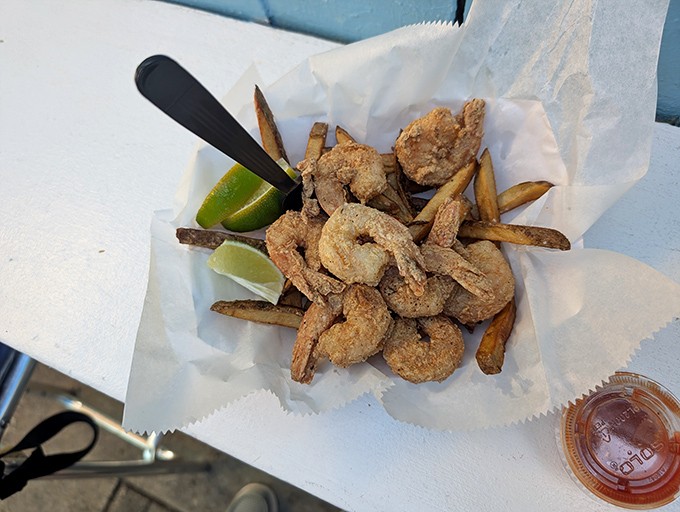 Those fried shrimp and fries could make a cardiologist weep, but your taste buds will sing hallelujah.