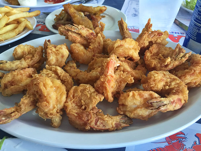 These fried shrimp aren't just cooked—they're transformed into crispy armor-clad knights of deliciousness ready to joust with your taste buds.