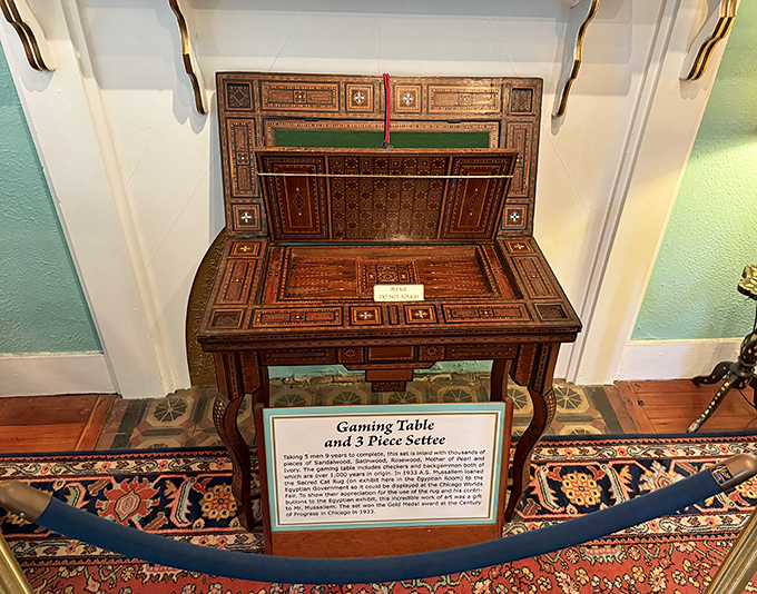 Gaming table that screams "Downton Abbey meets Casino Royale." Inlaid wood patterns so intricate they'd distract you from your losing hand.