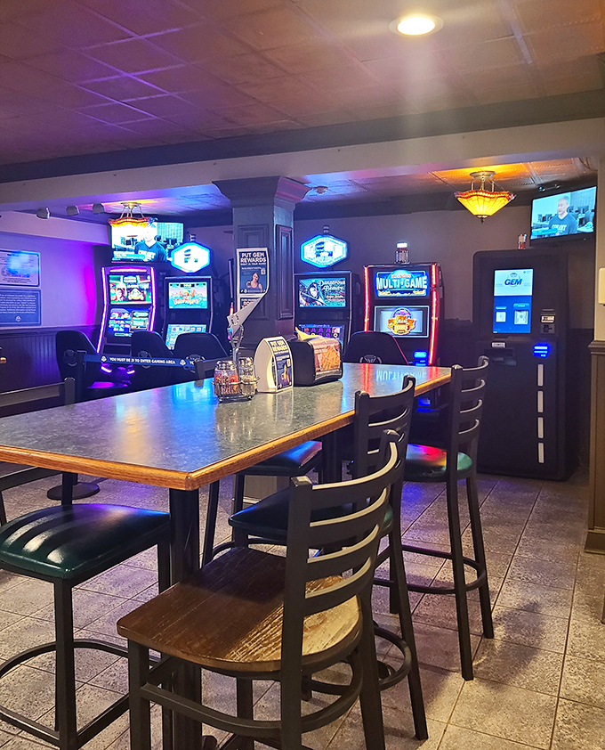 The gaming area proves that while waiting for pizza perfection, you can still test your luck at becoming a different kind of winner.