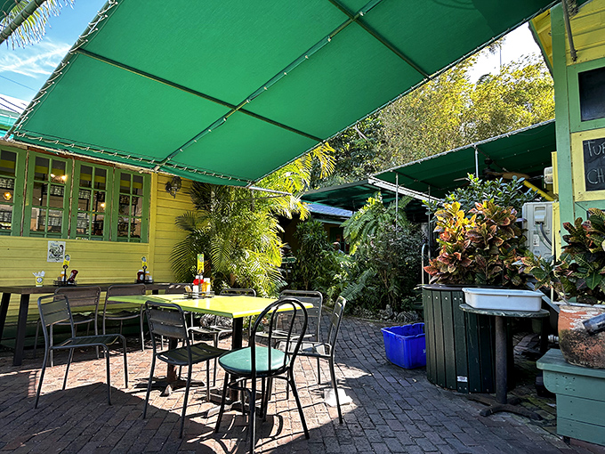 Garden seating under green canopies offers a tropical oasis where you can contemplate the meaning of life, which, in Key West, might just be pie.