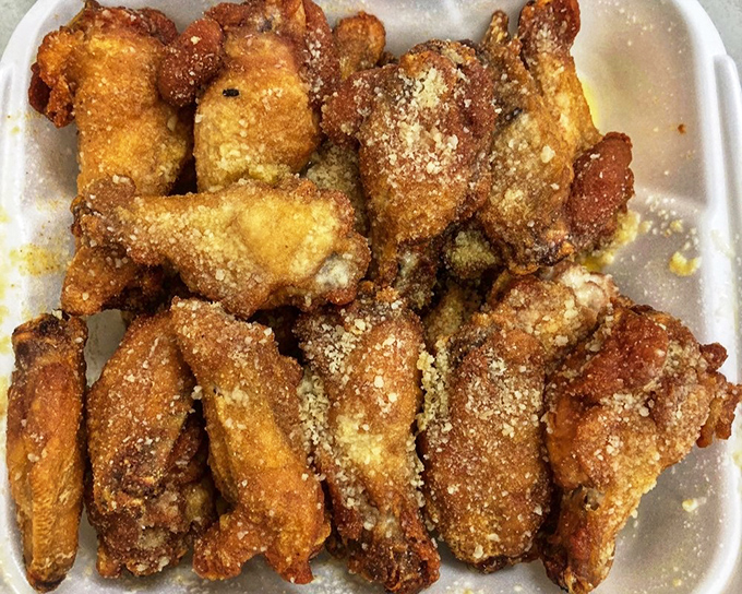 These aren't just wings—they're crispy, golden tickets to flavor town, dusted with parmesan and begging to be devoured.