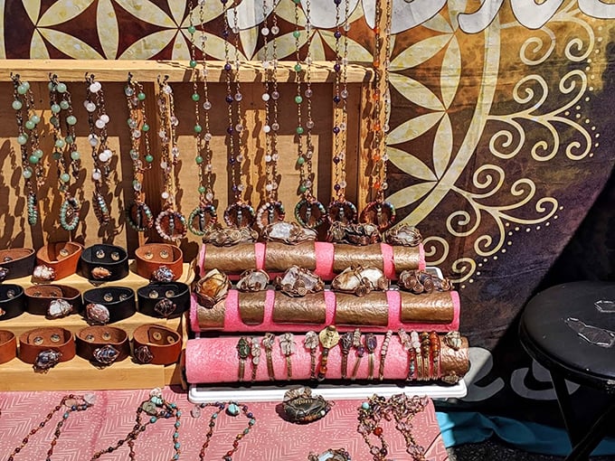 Handcrafted jewelry displays transform the mundane marketplace into a gallery of wearable art, each piece with its own story.