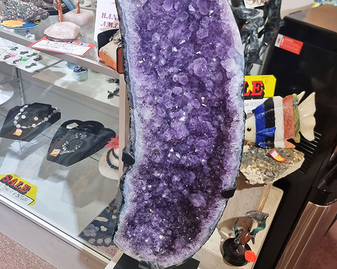 Nature's artwork! This spectacular amethyst geode brings earthy glamour and healing energy to this corner of vintage splendor.