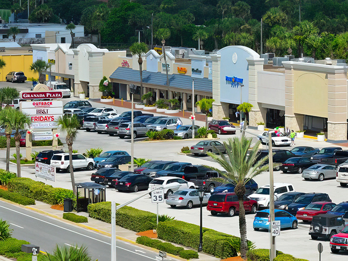 Granada Plaza proves shopping centers don't have to be soulless. Those royal palms standing sentinel over parking spaces are quintessentially Florida.