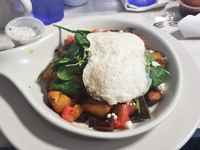 A breakfast bowl that's practically a garden party, crowned with eggs that waited for just the right moment to be perfectly cooked.