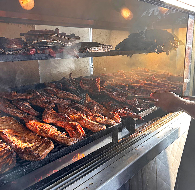 The aquarium smoker&mdash;Chicago's contribution to barbecue architecture&mdash;where meat transforms from ordinary to extraordinary through smoke and time.