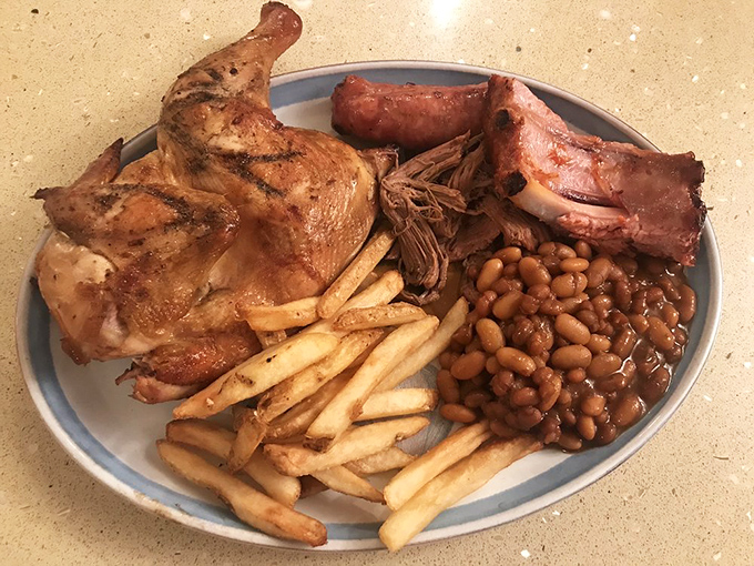 Half a chicken, full satisfaction. When smoke meets skin at just the right temperature, magic happens&mdash;and those beans aren't just a side, they're an event.