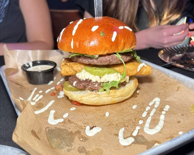 The classic burger and fries, elevated to art form. Sometimes simplicity executed perfectly is the most revolutionary act of all.