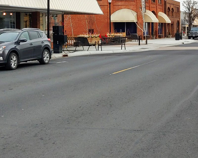 Downtown benches invite lingering conversations&mdash;the original social network that never needs a password update.
