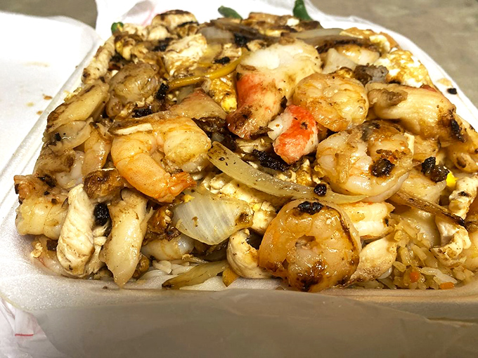 Hibachi-grilled shrimp and chicken with caramelized onions&mdash;proof that sometimes the best plate is the simplest one.
