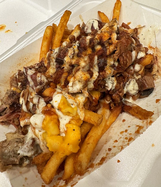 Behold the loaded fries&mdash;a glorious mess of meat, cheese, and potato that renders forks useless and conversation impossible until the last bite.