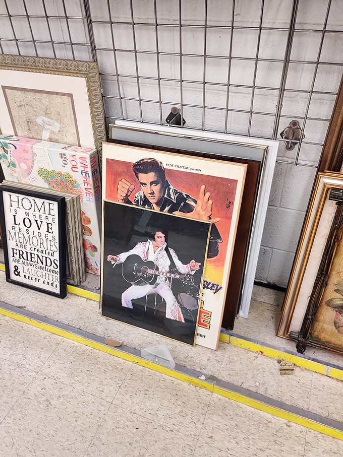 The King lives on in thrift store art! Elvis memorabilia shares wall space with inspirational quotes, creating the ultimate conversation starter for any room.