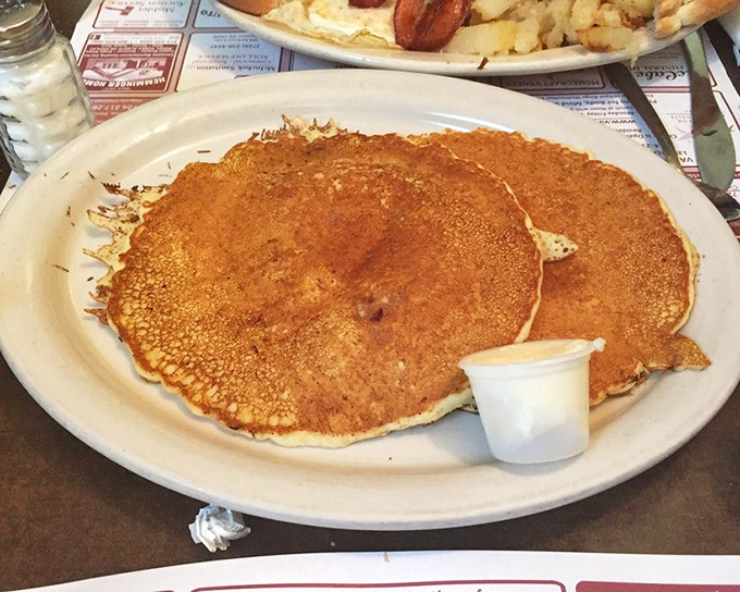 Pancakes so perfectly golden they deserve their own Instagram account. These fluffy discs of joy have been flipped with practiced precision.