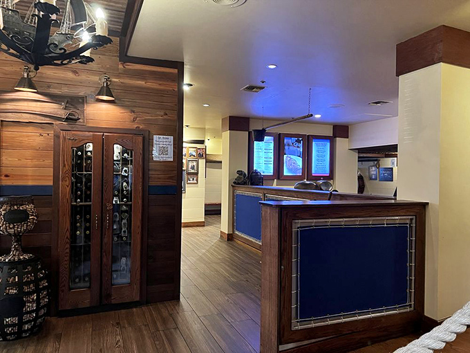 Wood, tile, and nautical blue accents create an atmosphere that's both upscale and comfortable&mdash;like a yacht club that actually wants you there.