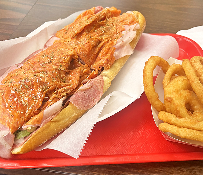 The Italian sub: a United Nations of cured meats, where salami, ham, and provolone sign a delicious peace treaty in your mouth.