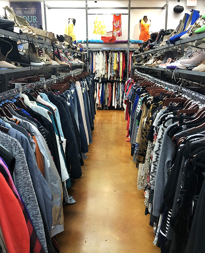 Racks upon racks create fashion canyons to explore, where each turn might reveal that perfect black dress or cozy sweater you didn't know you needed.