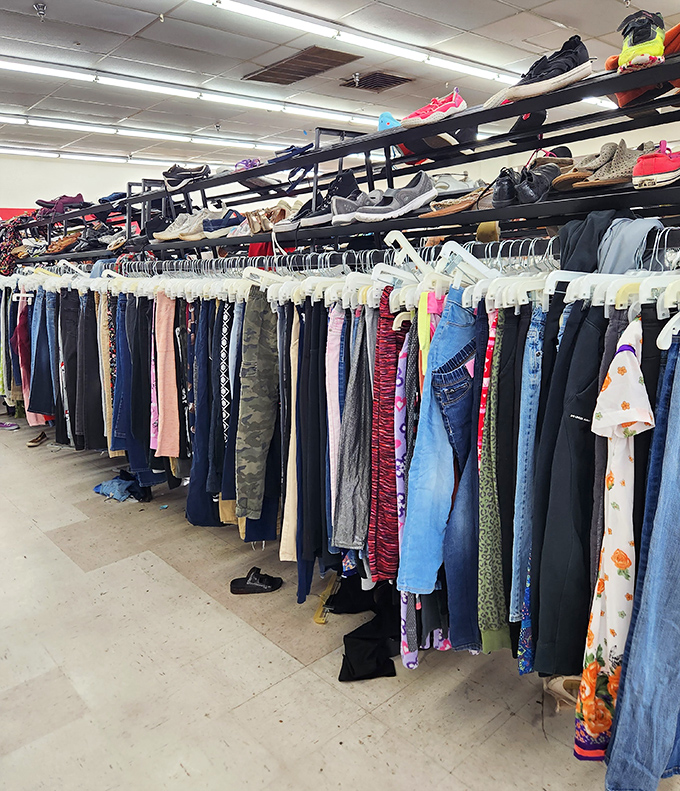 Jeans and shoes stacked with hopeful anticipation, like wallflowers at a dance waiting for the right partner.