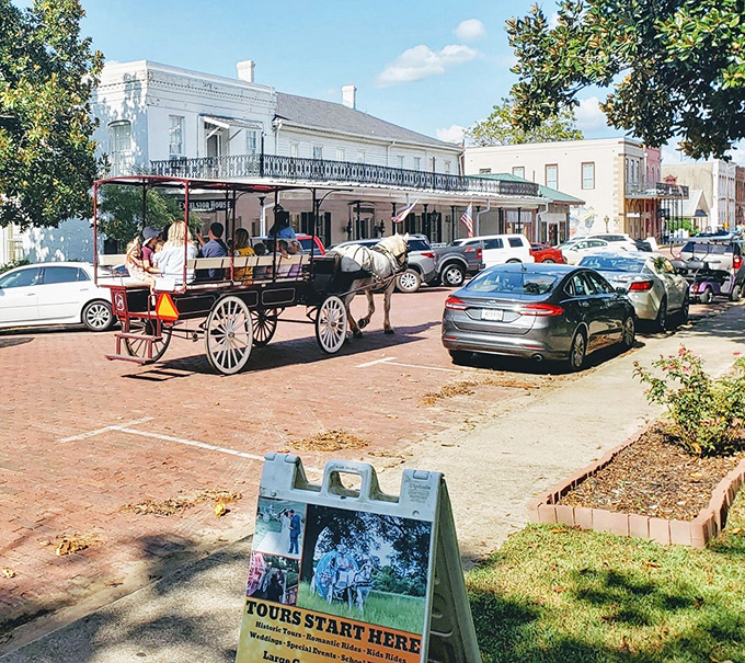 Horse-drawn carriages clip-clop through town, because sometimes the best way forward is actually backward.