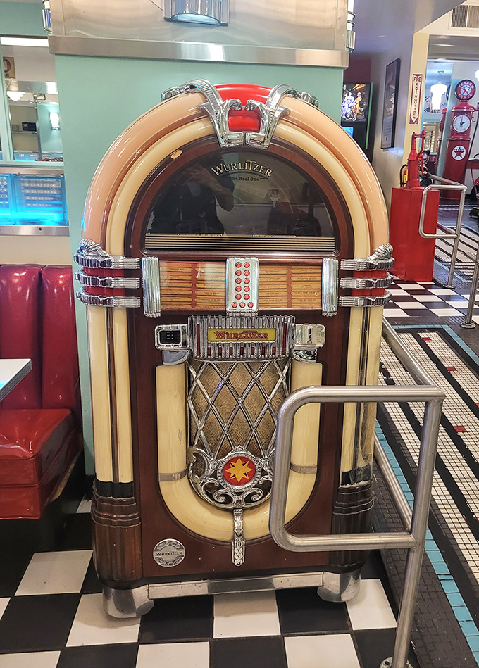 This gleaming jukebox stands ready to soundtrack your meal with the perfect nostalgic musical accompaniment.
