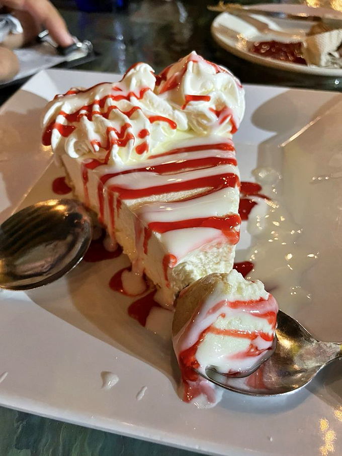 Key Lime Pie with strawberry sauce that makes your taste buds do the conga. Light, tart, sweet, and exactly what you came to the Florida Keys to find.