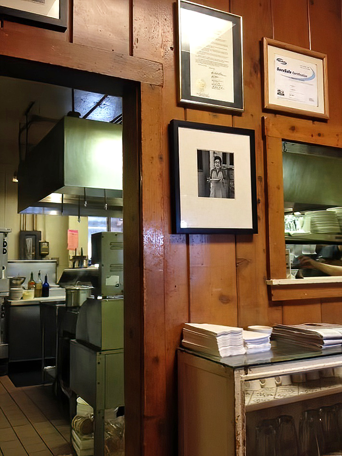 The kitchen pass reveals the engine room of flavor, where decades of culinary wisdom transform into the dishes that keep people returning.