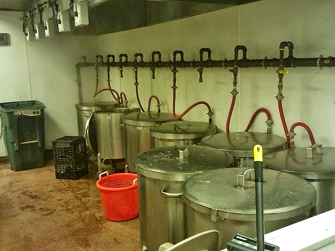 Industrial-strength steamers lined up like culinary artillery, ready to transform raw crabs into seasoned perfection.