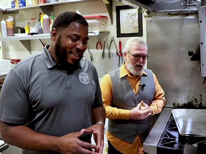Where the magic happens. The kitchen crew shares a moment of camaraderie between creating those perfect medium-rare masterpieces that keep tables full.