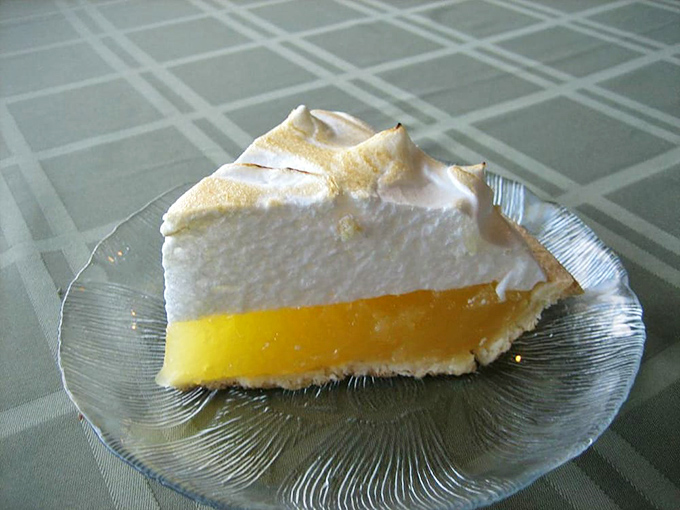 Lemon meringue pie with clouds of meringue floating above sunshine-yellow filling. The kind of dessert that makes you save room, even when you're full.