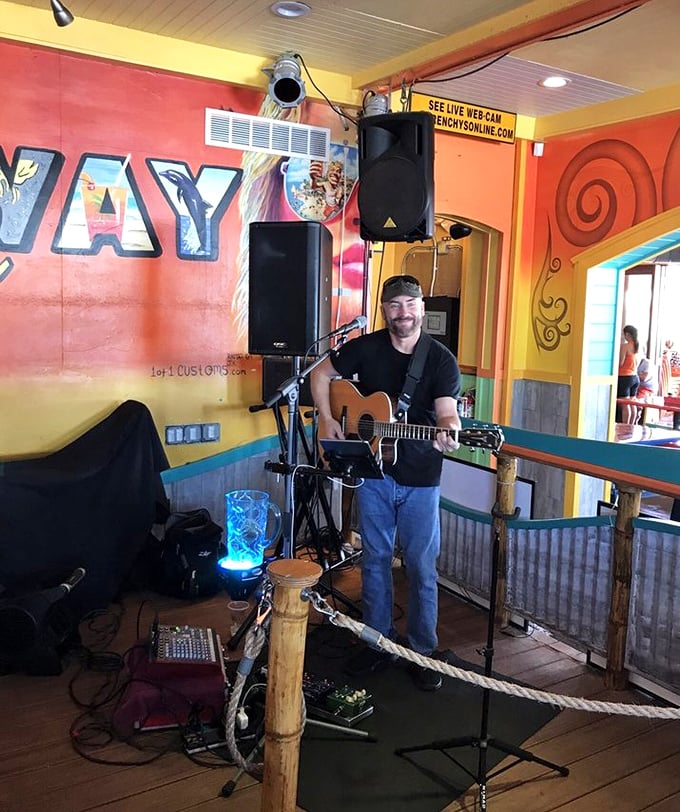 Live music sets the soundtrack for your seafood feast, because nothing pairs with octopus quite like acoustic guitar at sunset.