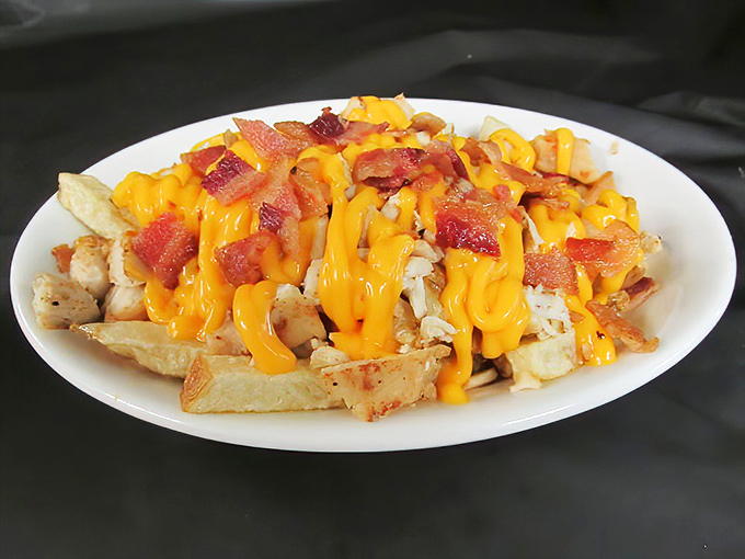 Loaded fries that don't know when to quit&mdash;crispy potatoes buried under an avalanche of melted cheese and bacon that would make a cardiologist weep.