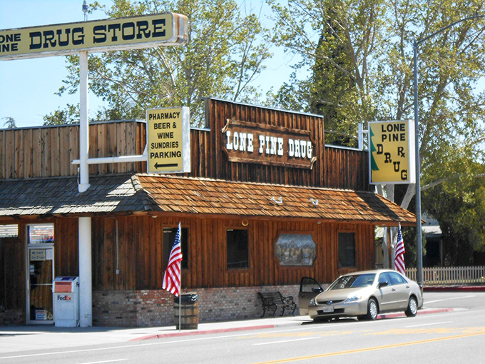 The Lone Pine Drug Store embraces its Western heritage with wooden fa&ccedil;ade and American flags &ndash; part pharmacy, part time machine to the frontier days.