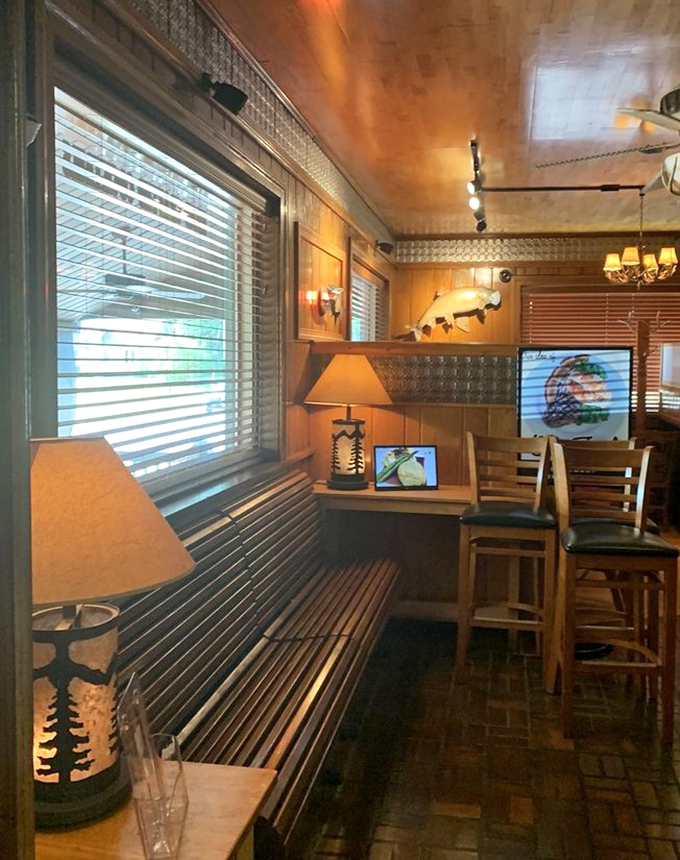 This intimate booth space feels like your own private dining cabin &ndash; perfect for romantic dinners or just hiding from people you know while you devour a porterhouse.