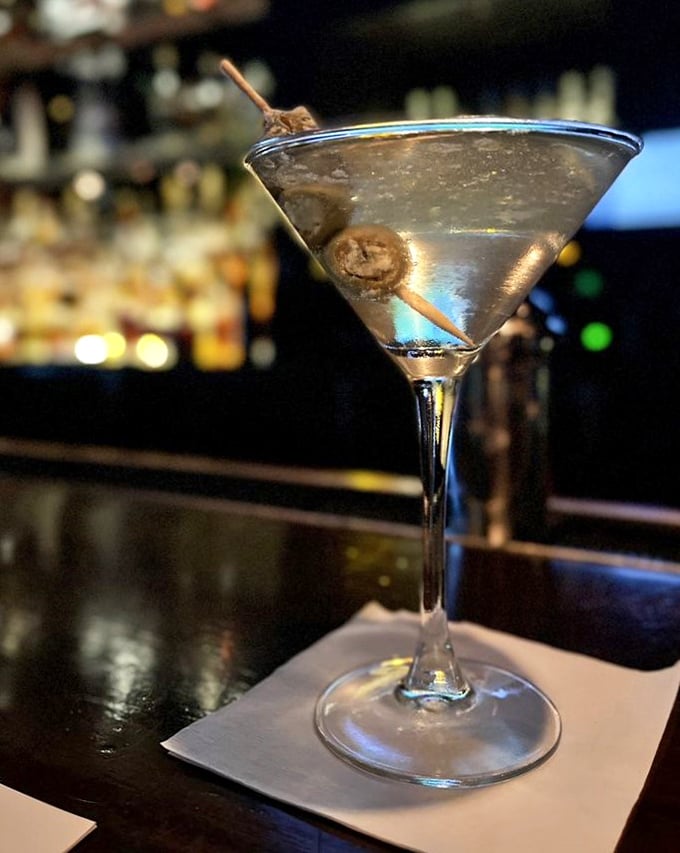The martini arrives crystal clear with blue-cheese-stuffed olives &ndash; a sophisticated handshake before the main event begins.