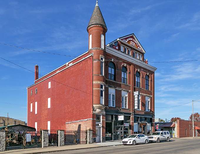 The Masonic Hall's distinctive turret and red brick facade stands as a reminder that secret societies once built the most interesting buildings in town.