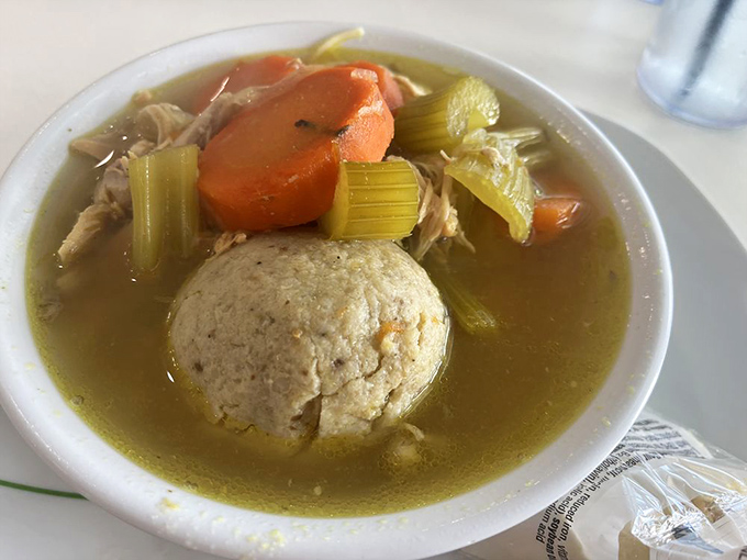 Matzo ball soup: Jewish penicillin elevated to an art form, with a broth so clear you could read your horoscope through it.