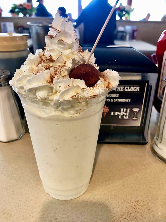 This isn't just a milkshake&mdash;it's a commitment. The whipped cream tower demands respect and a dedicated strategy.
