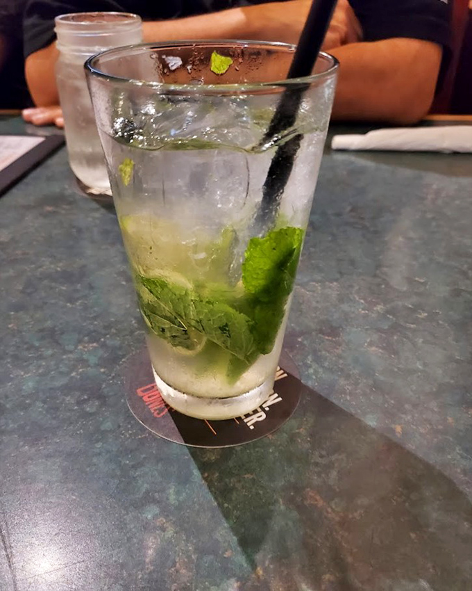 A mojito with fresh mint that offers a moment of refreshing clarity amid the smoky, savory barbecue storm &ndash; like finding an oasis in a delicious desert.