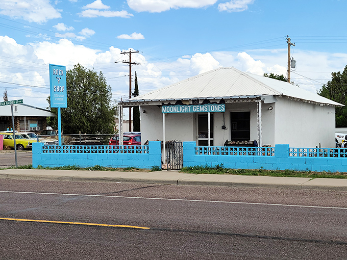 Moonlight Gemstones, with its cheerful blue fence, offers treasures from the earth in a building that looks like it has stories to tell.