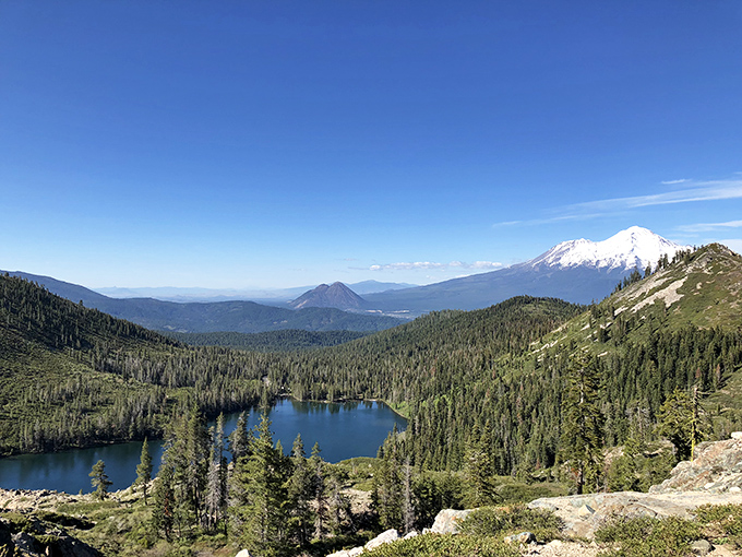 Beyond the caverns lies a wilderness playground where mountains meet sky in a landscape that screams "California postcard perfect."